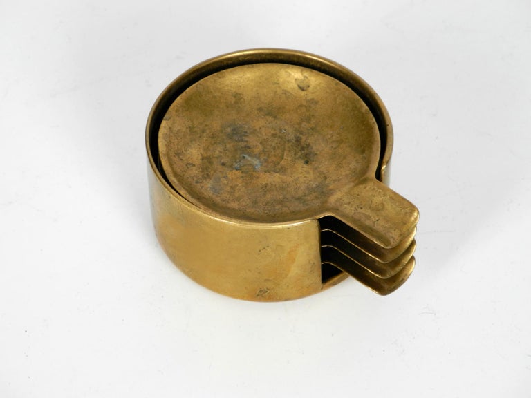 Set of Four Midcentury Brass Ashtrays with Holder at 1stdibs