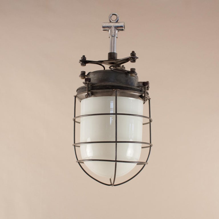 Industrial Milk Glass and Steel Caged Ship's Galley Lights at 1stDibs
