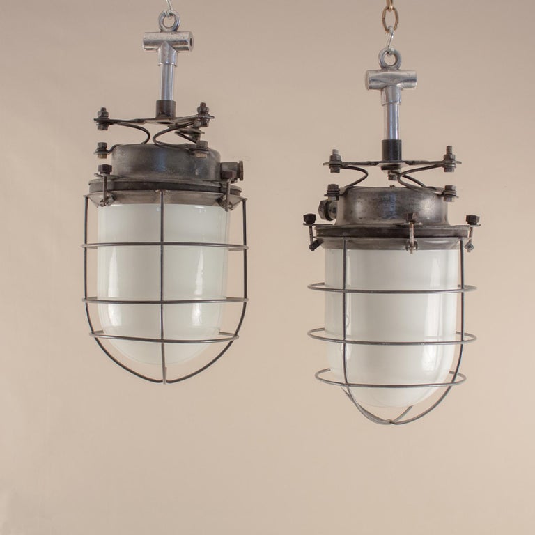 Industrial Milk Glass and Steel Caged Ship's Galley Lights at 1stDibs