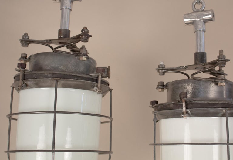 Industrial Milk Glass and Steel Caged Ship's Galley Lights at 1stDibs