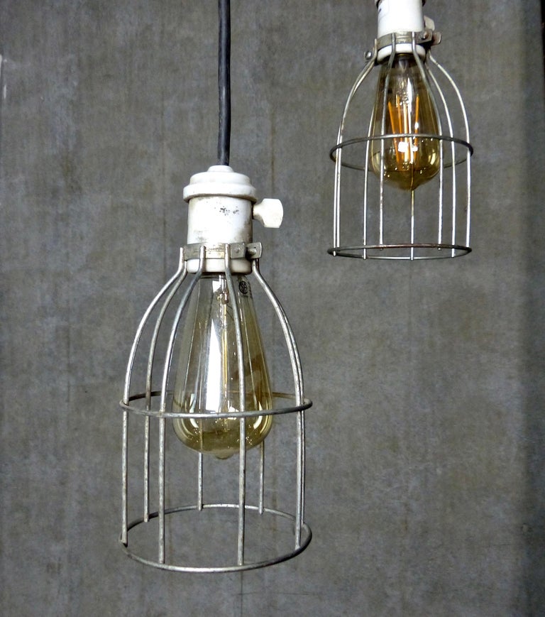 Set of Three circa 1930 Caged Industrial Lights For Sale at 1stDibs