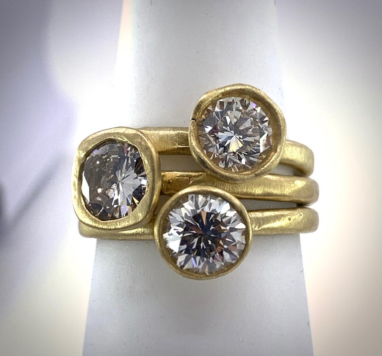 Set of Three Stacking Diamond Solitaires in 18 Karat Yellow Gold at 1stDibs
