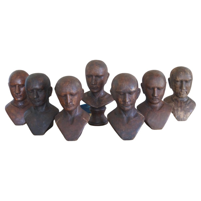 Seven art deco oak display heads. France 1930's For Sale at 1stDibs