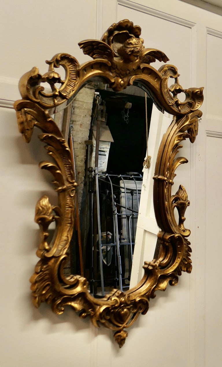Shaped Rococo Style Gilt Wall Mirror For Sale at 1stDibs