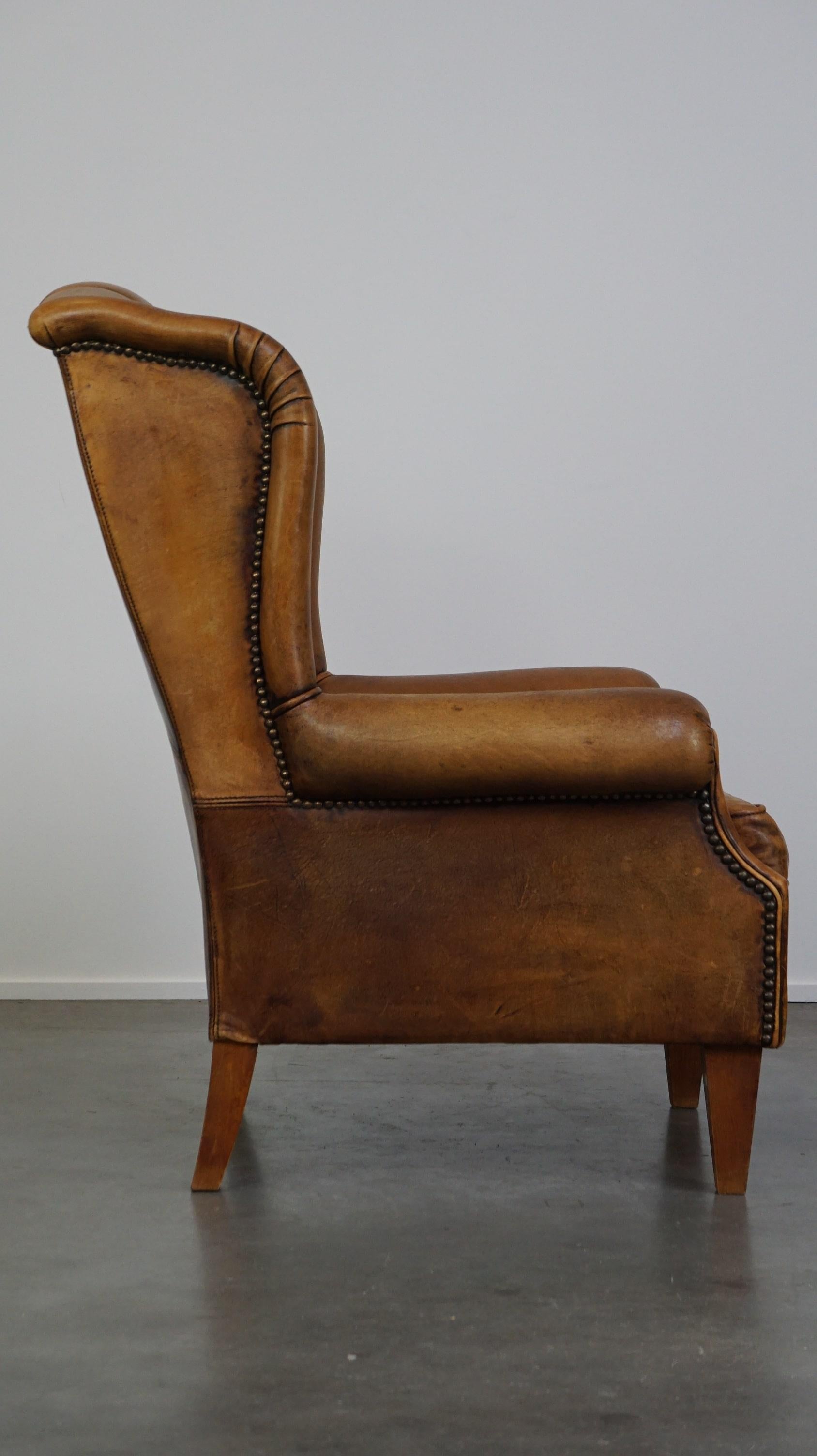 Sheepskin wing chair with a unique design and a beautiful patina For ...