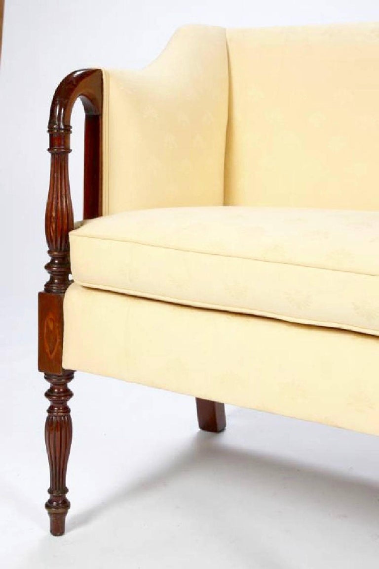Sheraton Camel Back Sofa with Mahogany Reeded Legs and Inlay at 1stDibs