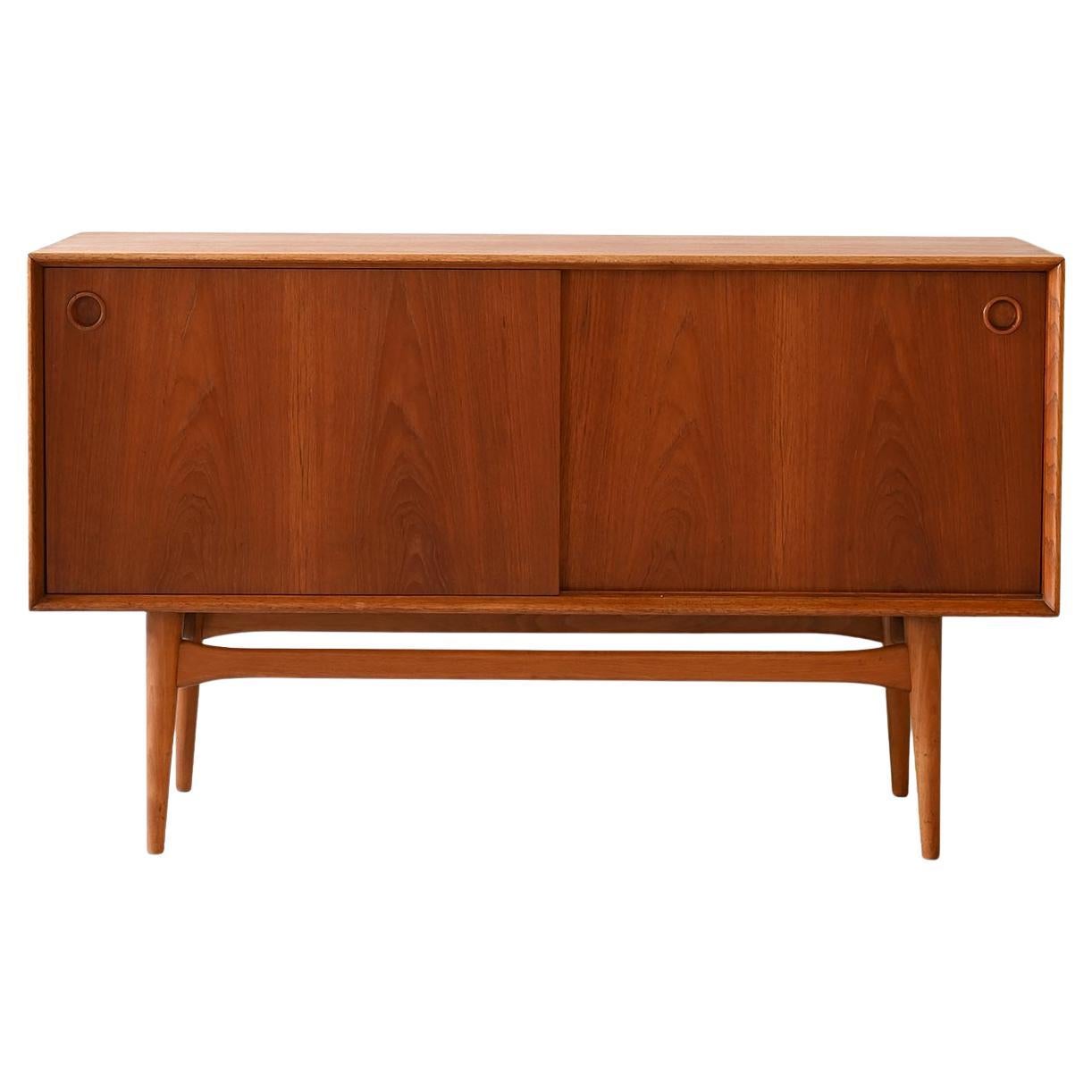 Scandinavian sideboard with sliding doors For Sale at 1stDibs