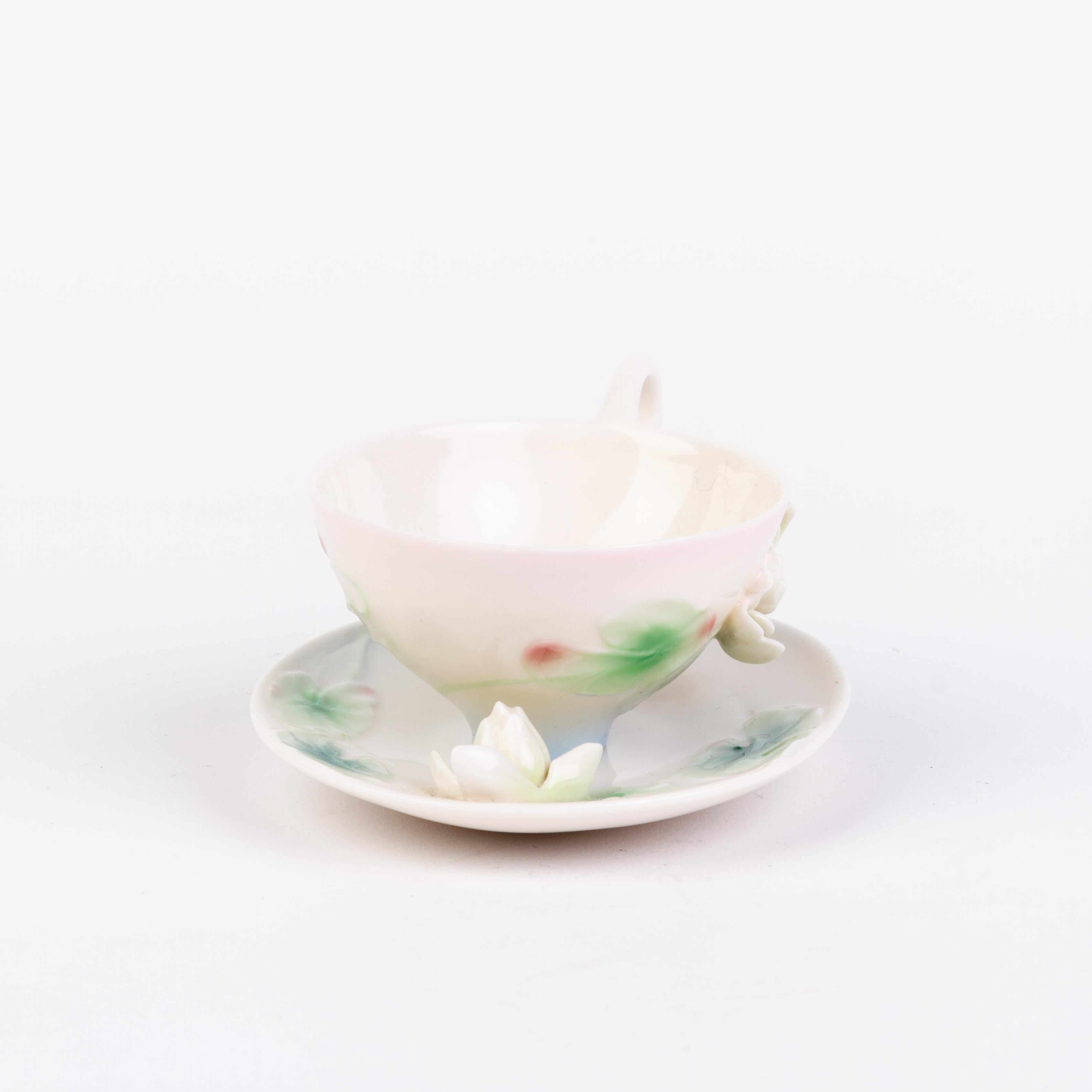 Signed Franz Porcelain Relief Floral Teacup and Saucer For Sale at 1stDibs