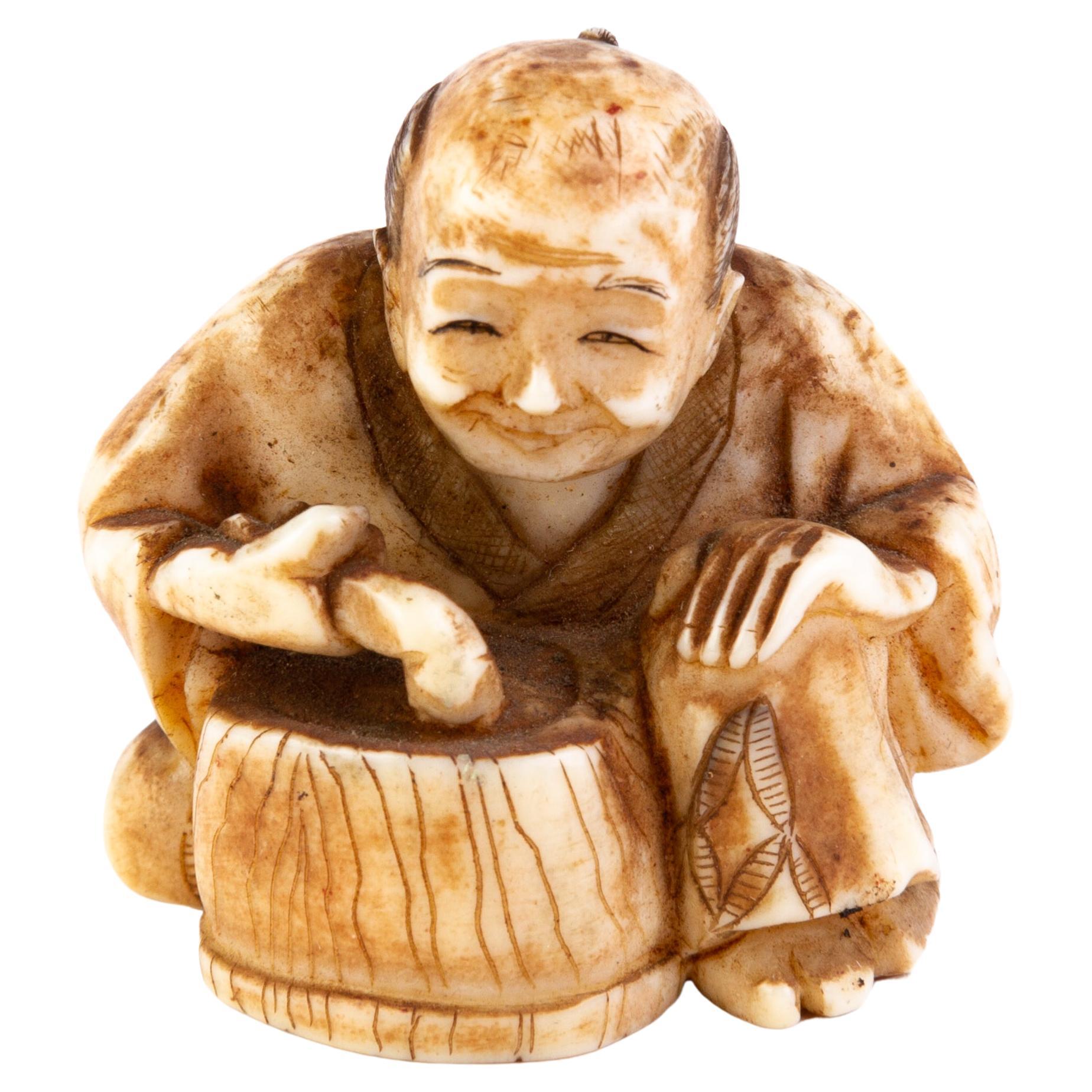 Signed Japanese Carved Netsuke Inro Man Cooking For Sale at 1stDibs