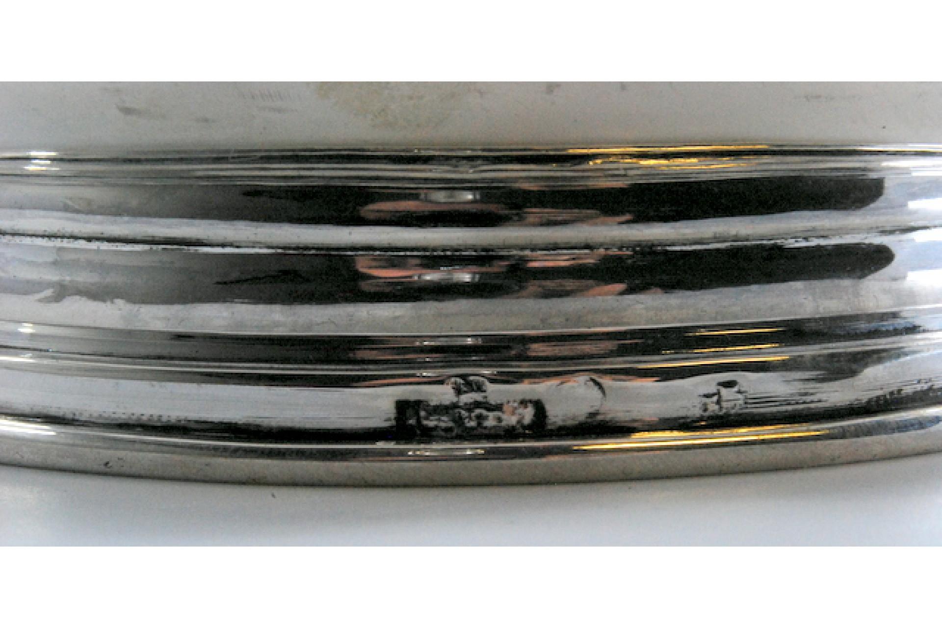 Silver chamber pot with circular base reliefs and knob on the removable ...