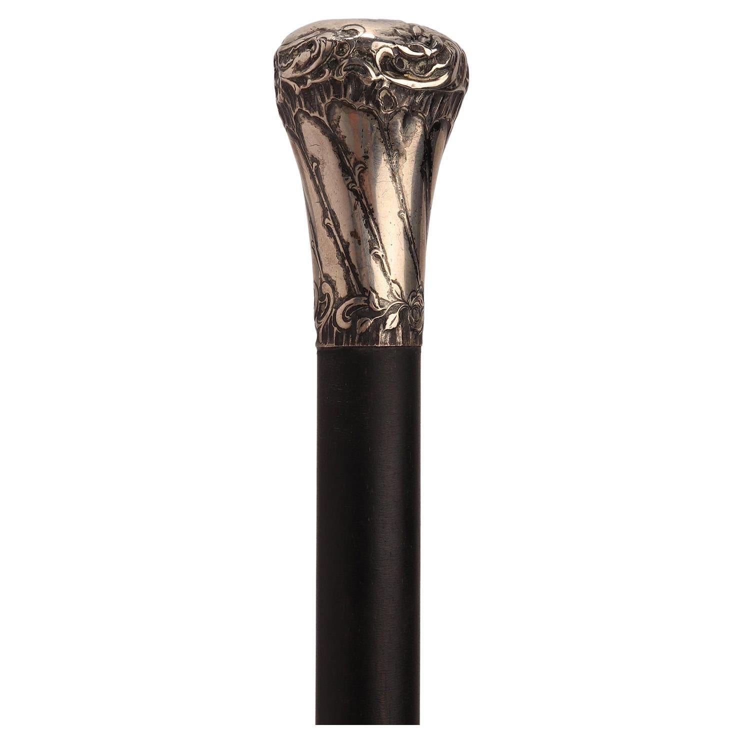 Silver handle walking stick, milord shape with leaves, France 1900. For ...