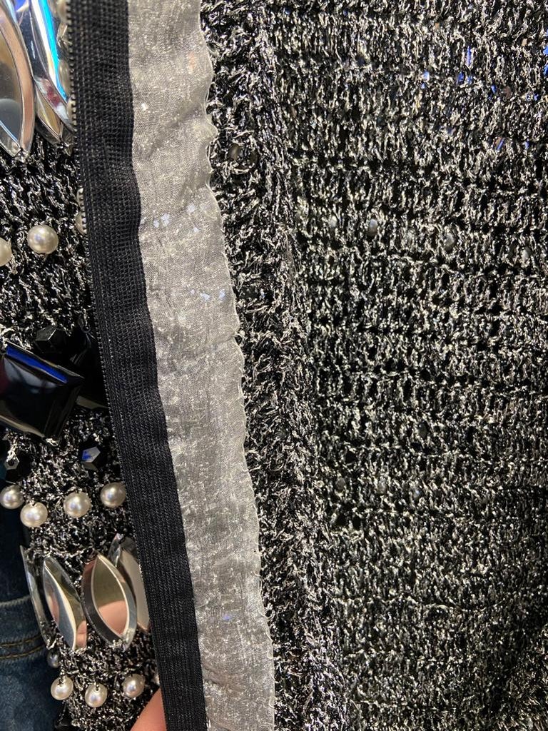 Silver lurex knit vest with oversize black and silver cabochons Loris ...