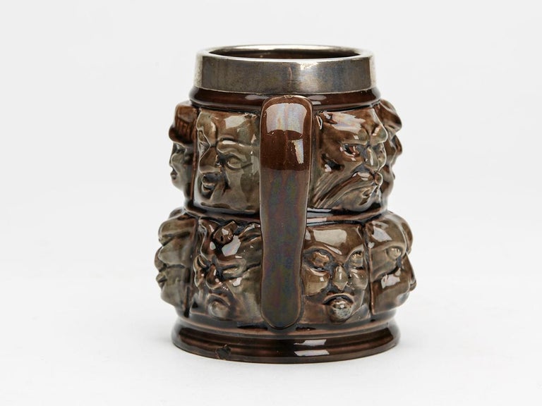 Silver Mounted Thirteen Grotesque Faces Molded Glazed Pottery Mug For ...