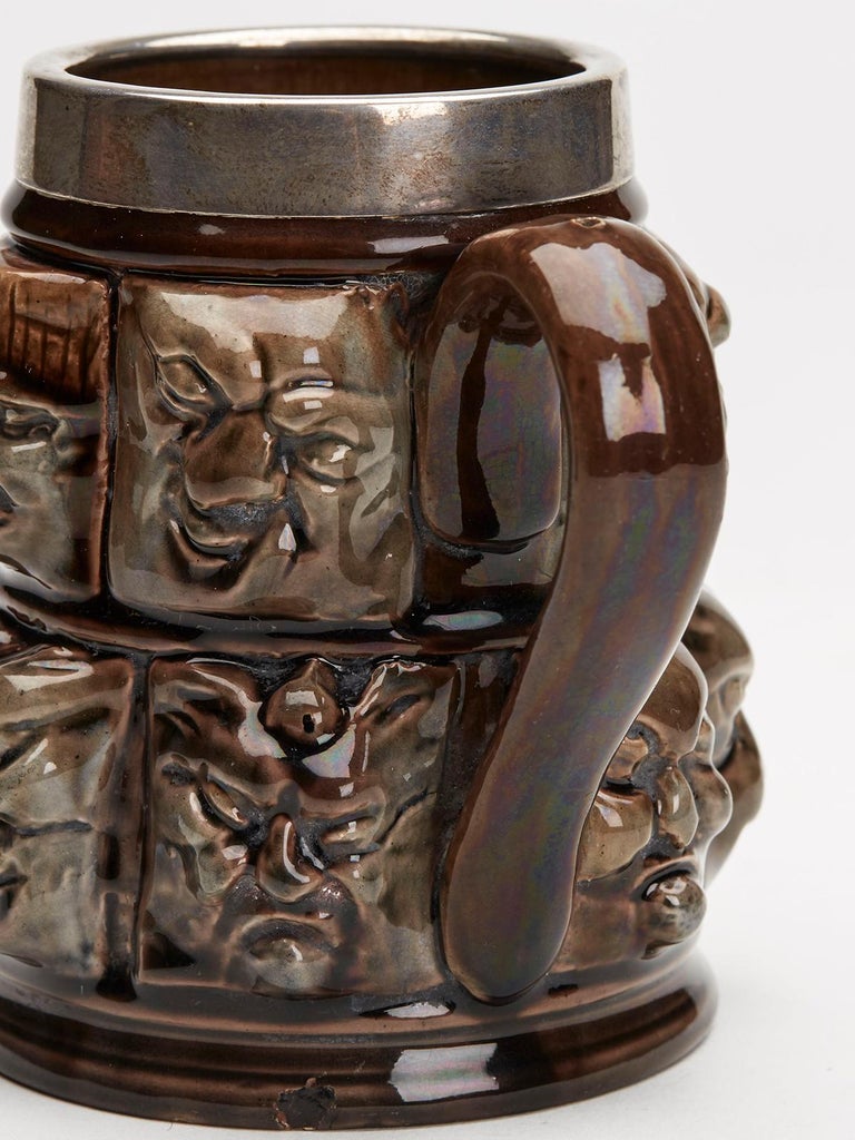 Silver Mounted Thirteen Grotesque Faces Molded Glazed Pottery Mug For ...