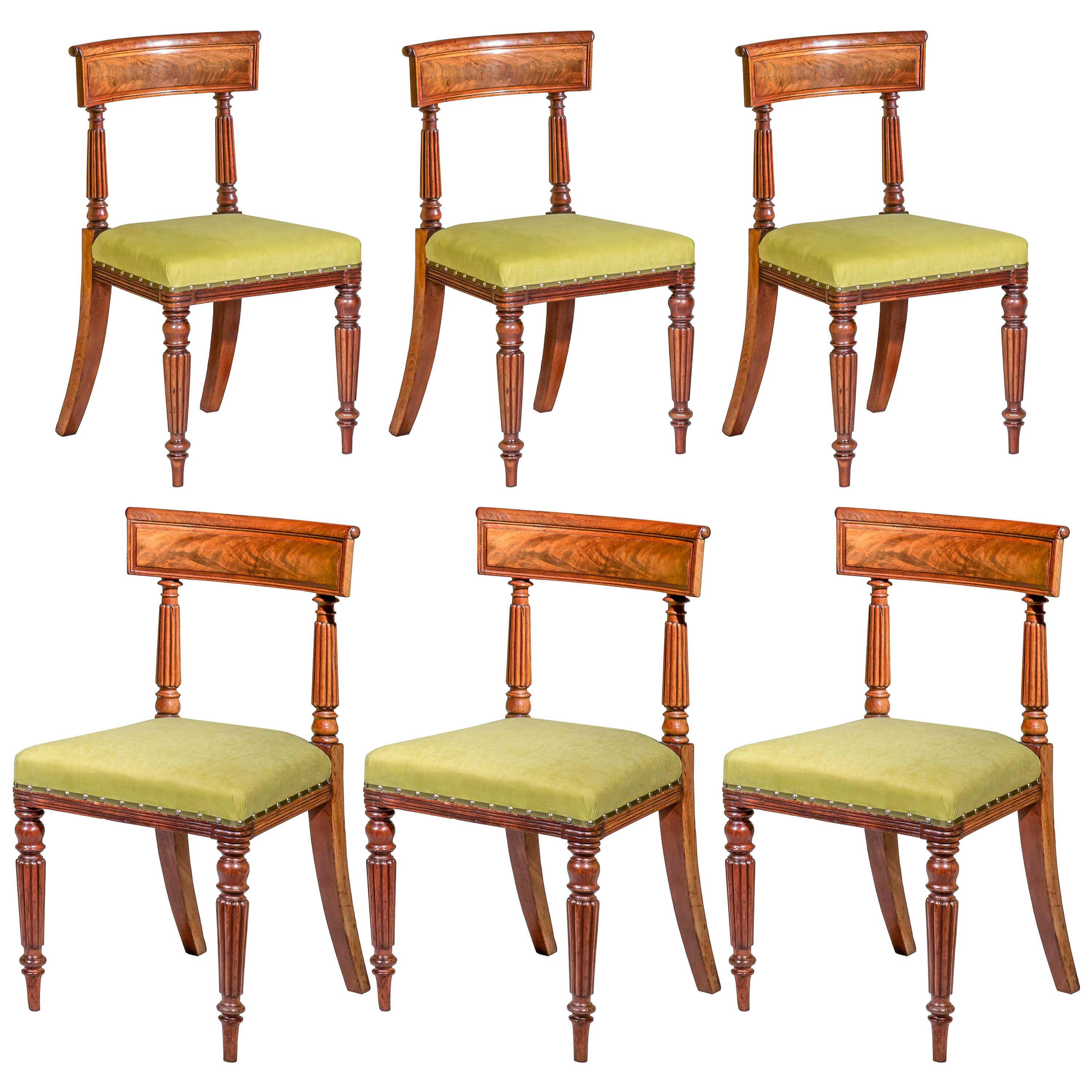 A pair of Regency brown oak hall chairs attributed to George Bullock at ...