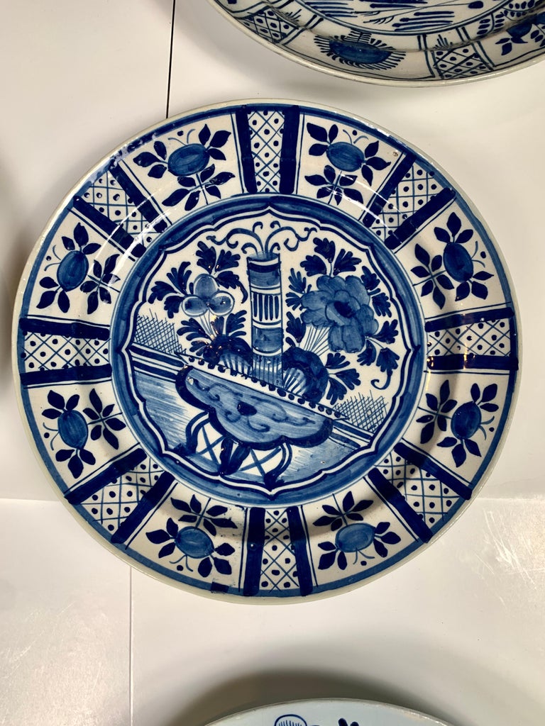 Six blue and white Delft chargers dating from the mid-18th century to ...