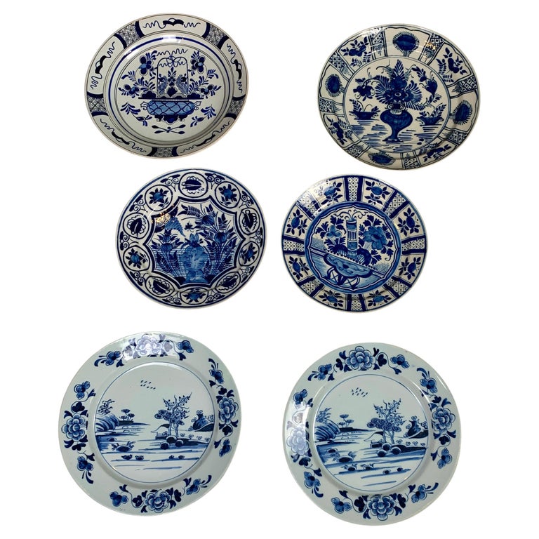 Six blue and white Delft chargers dating from the mid-18th century to ...