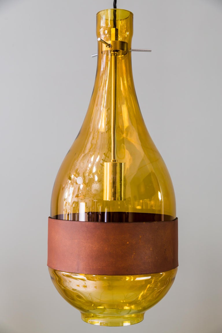 Six Kalmar Pendant Lights, Amber Glass Leather, 1970 at 1stDibs