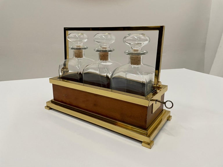 Sleek Brass and Mahogany Set of 3 Glass Liquor Decanters Tantalus For ...
