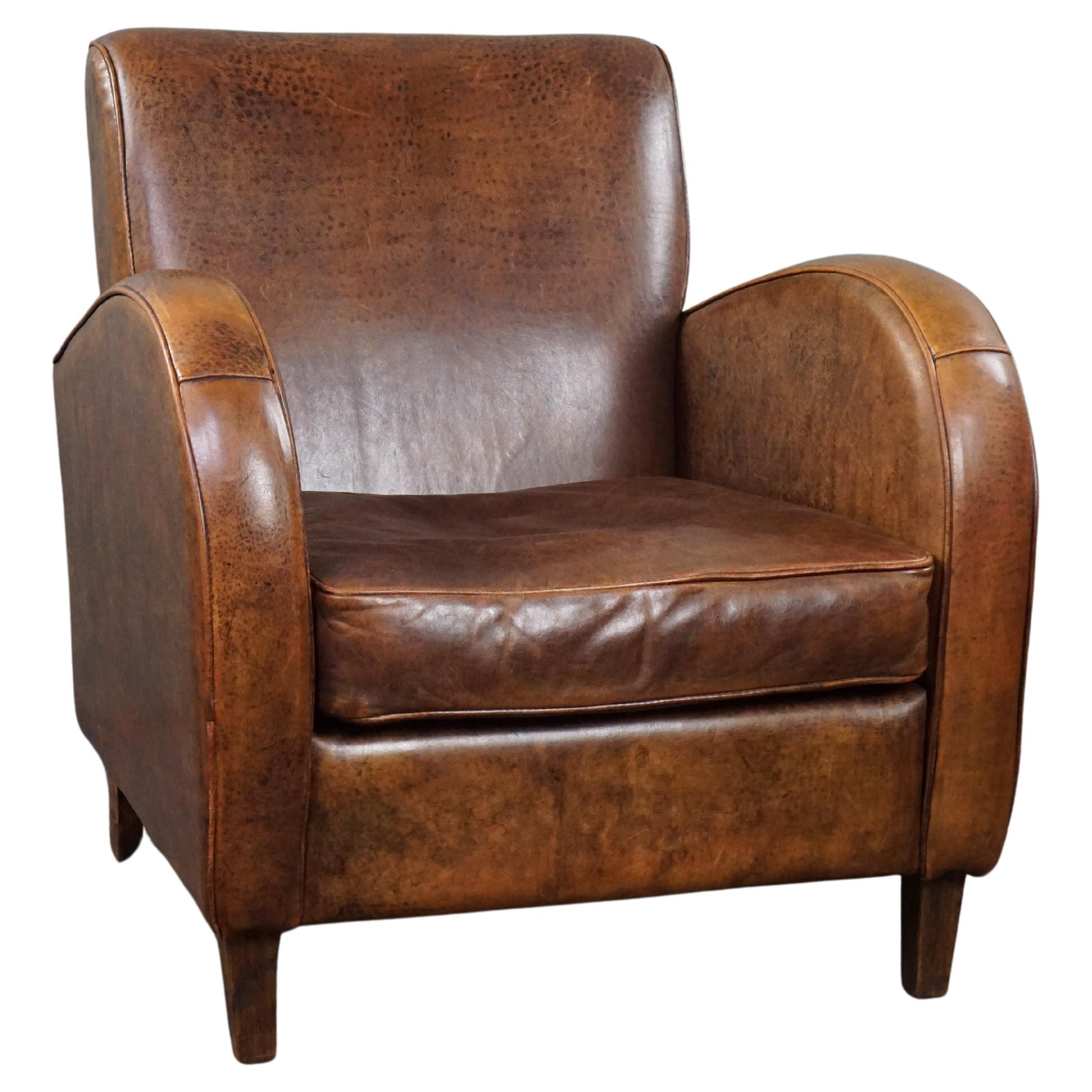Stately sheep leather armchair, comfortable seat, and high back For ...