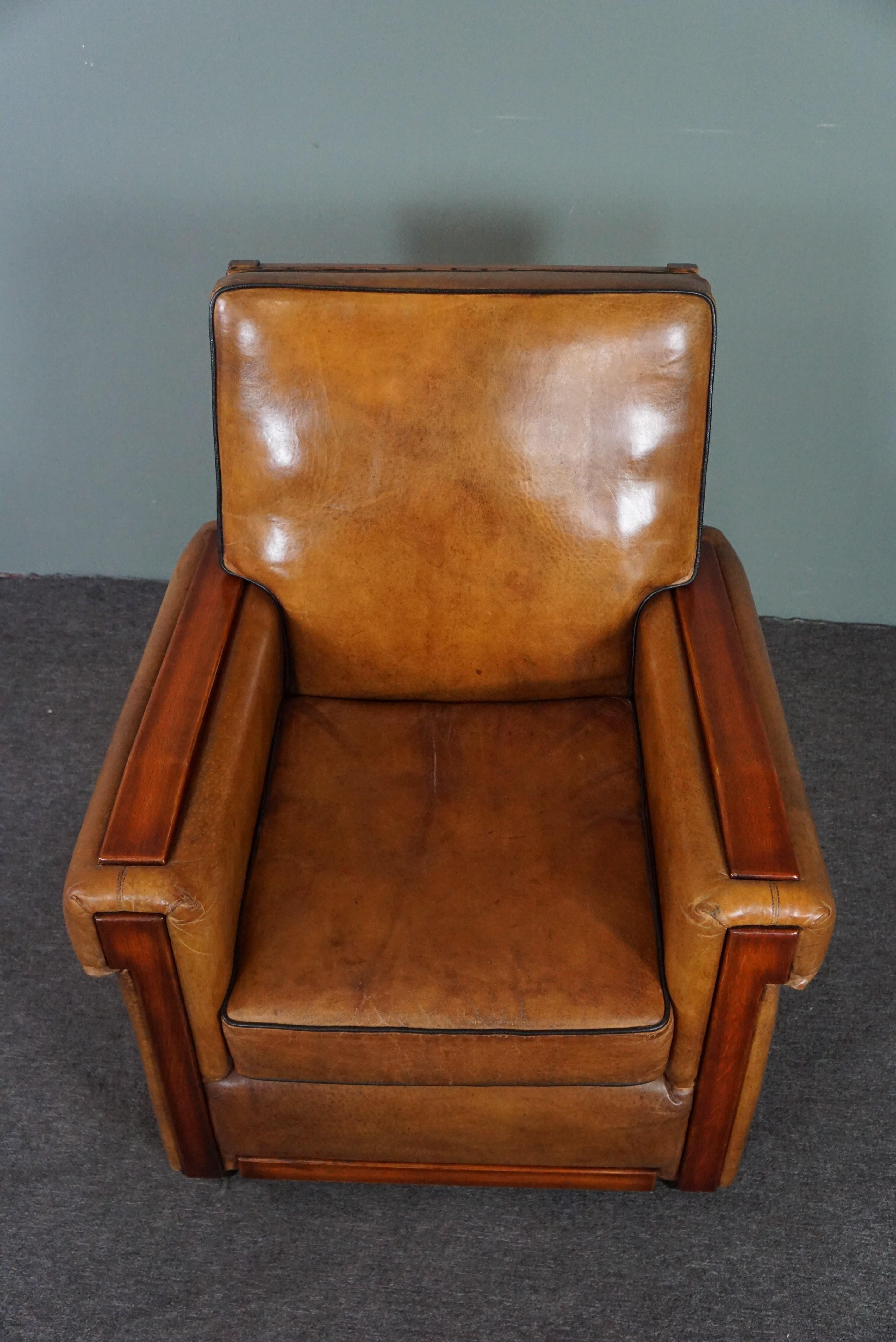 Sleekly designed sheepskin Art Deco design armchair For Sale at 1stDibs