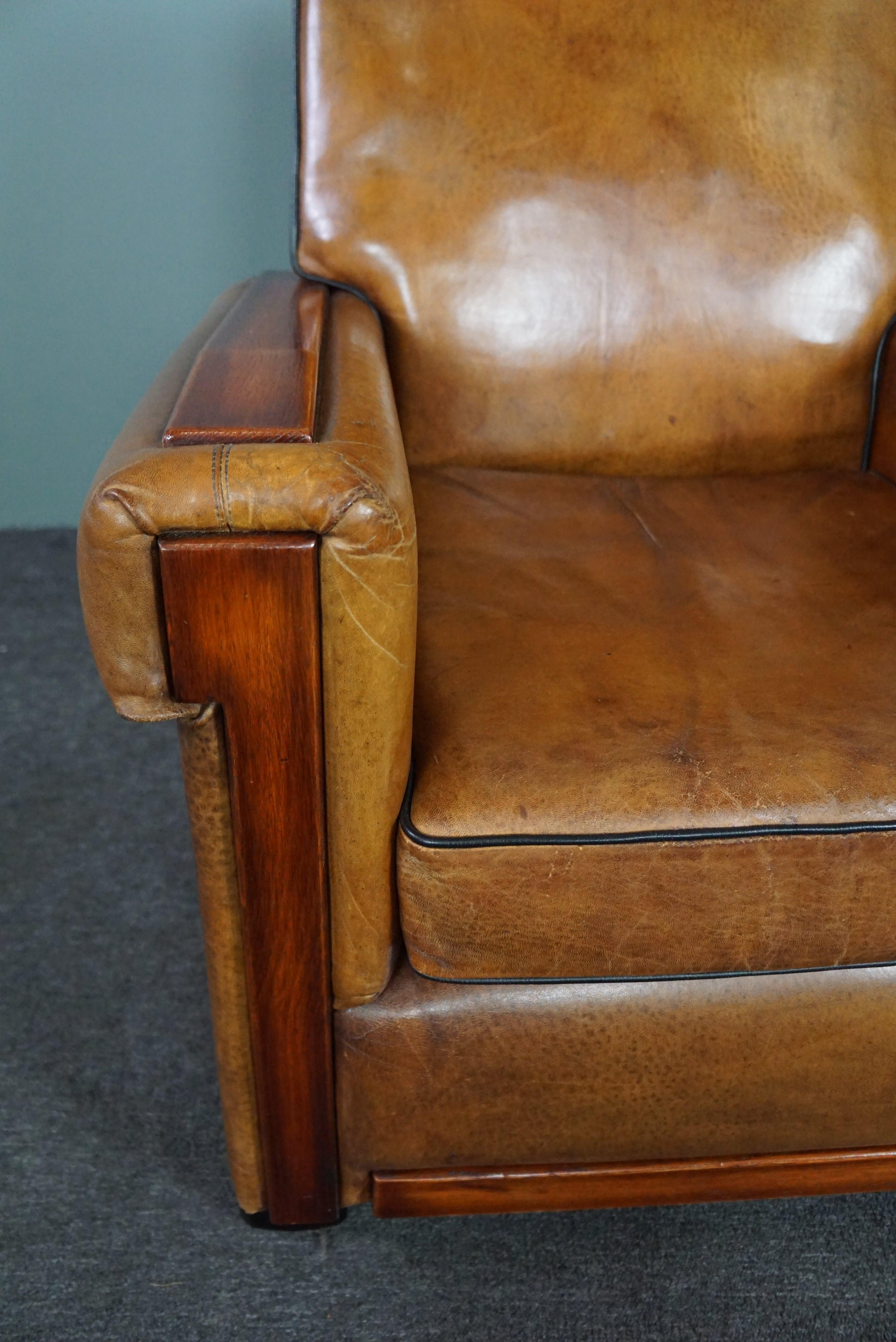Sleekly designed sheepskin Art Deco design armchair For Sale at 1stDibs