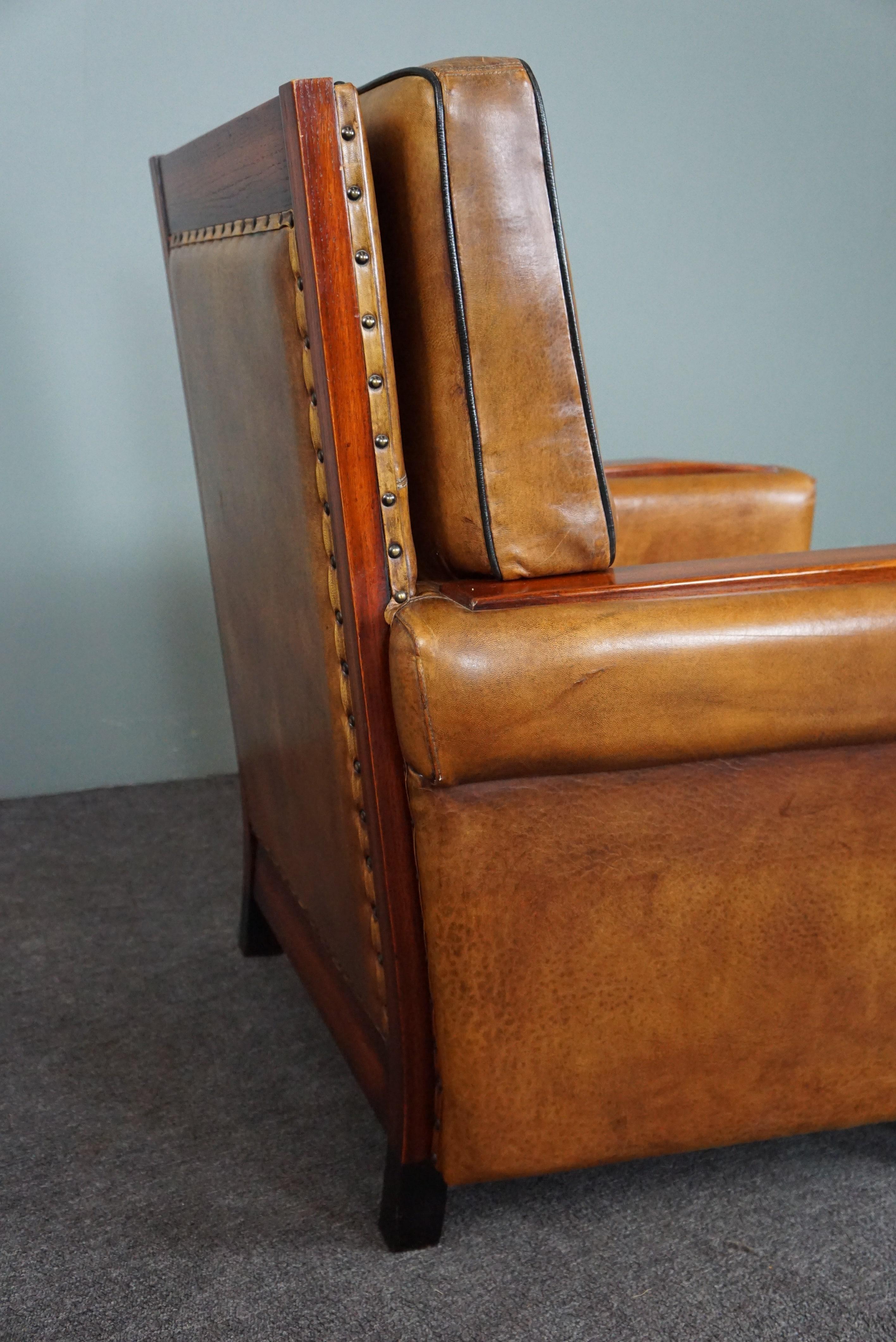 Sleekly designed sheepskin Art Deco design armchair For Sale at 1stDibs