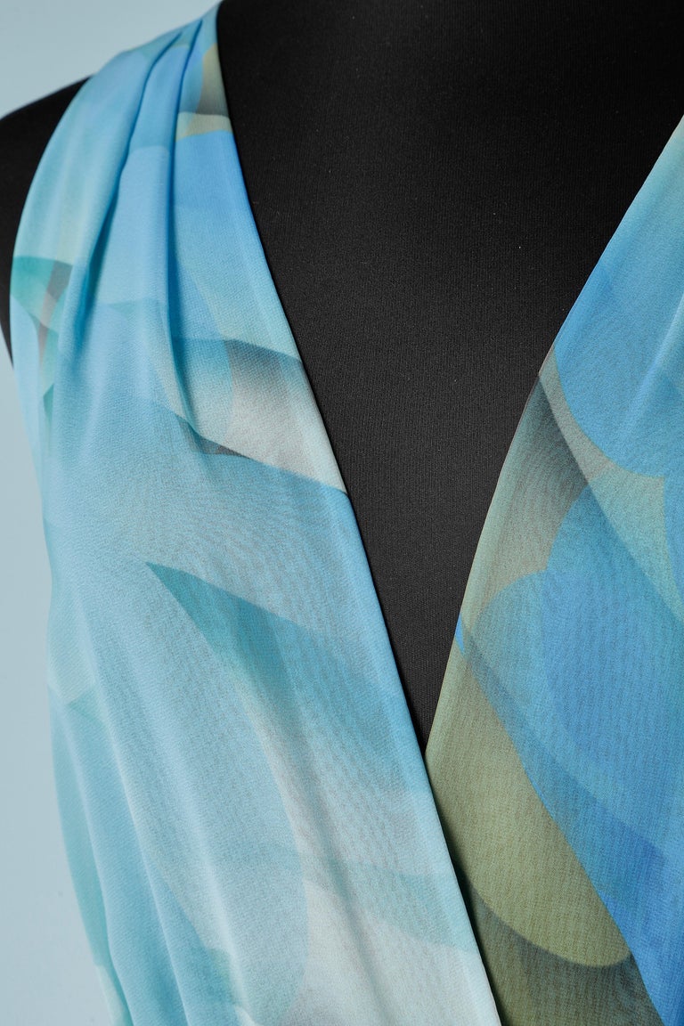 Sleeveless wrapped and printed evening dress with bead work on waist ...