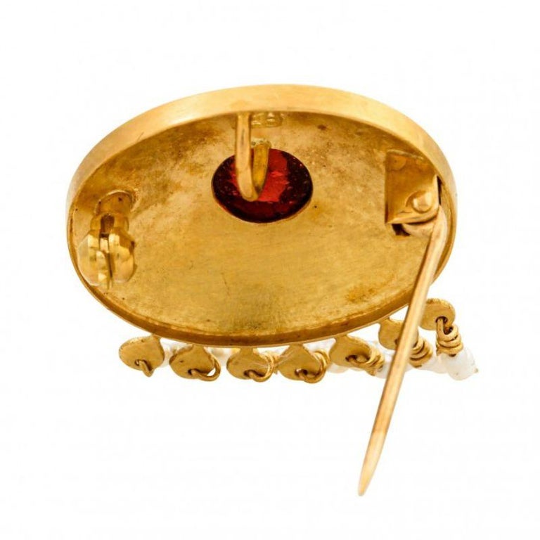 Small Brooch with Garnet Cabochon For Sale at 1stDibs