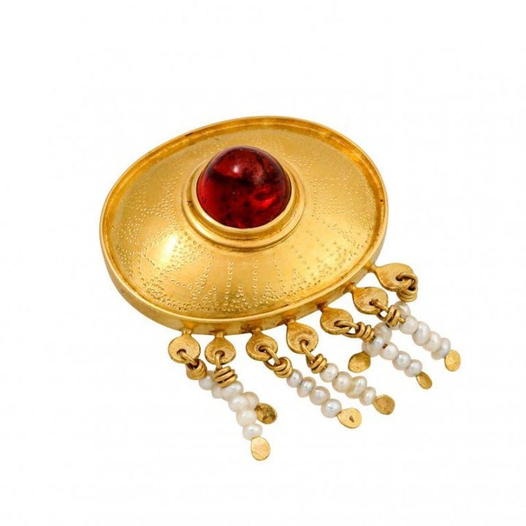 Small Brooch with Garnet Cabochon For Sale at 1stDibs