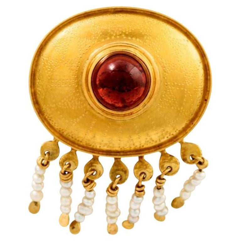 Small Brooch with Garnet Cabochon For Sale at 1stDibs