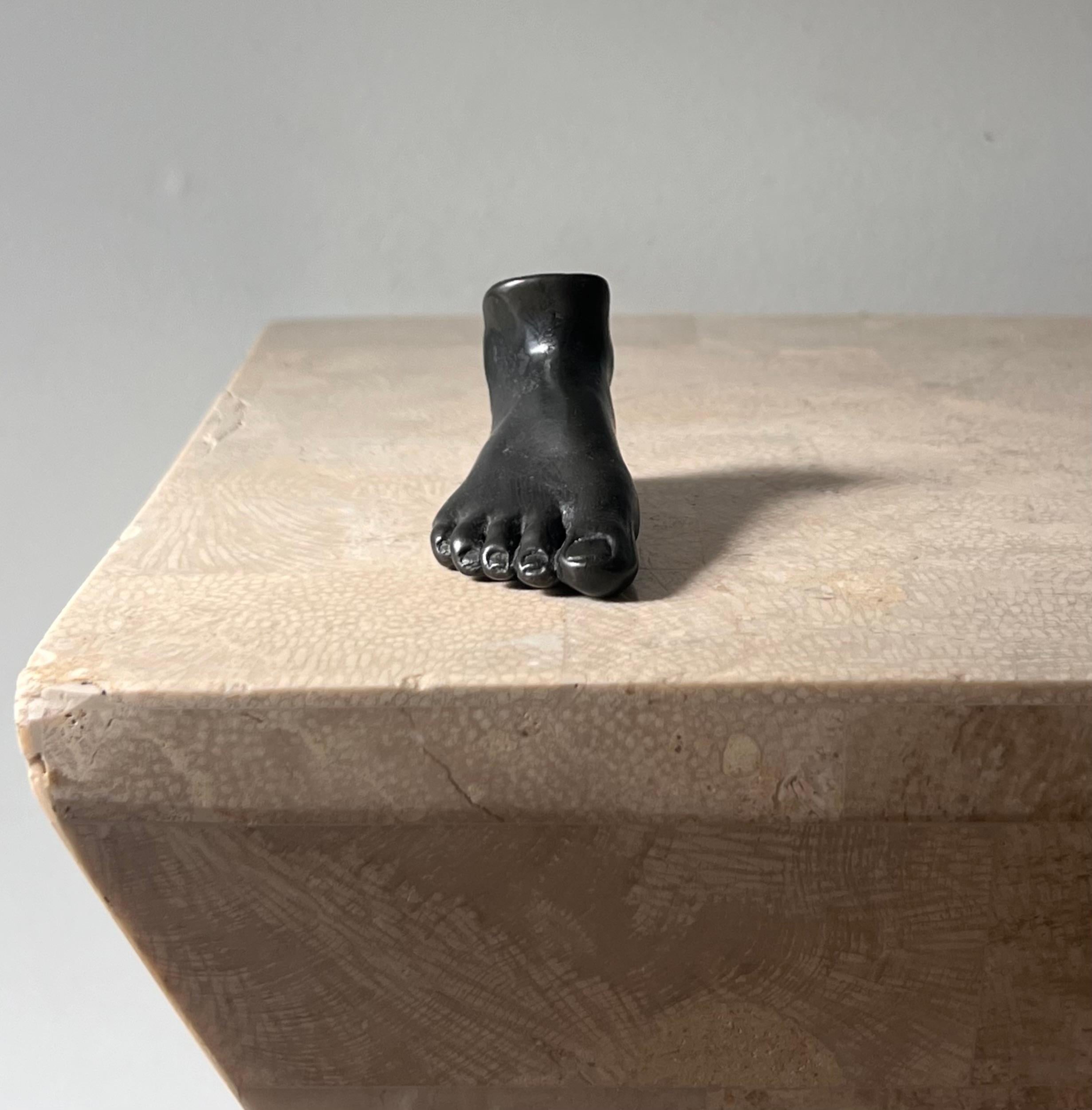 Small cast bronze sculpture of a foot, 20th century For Sale at 1stDibs