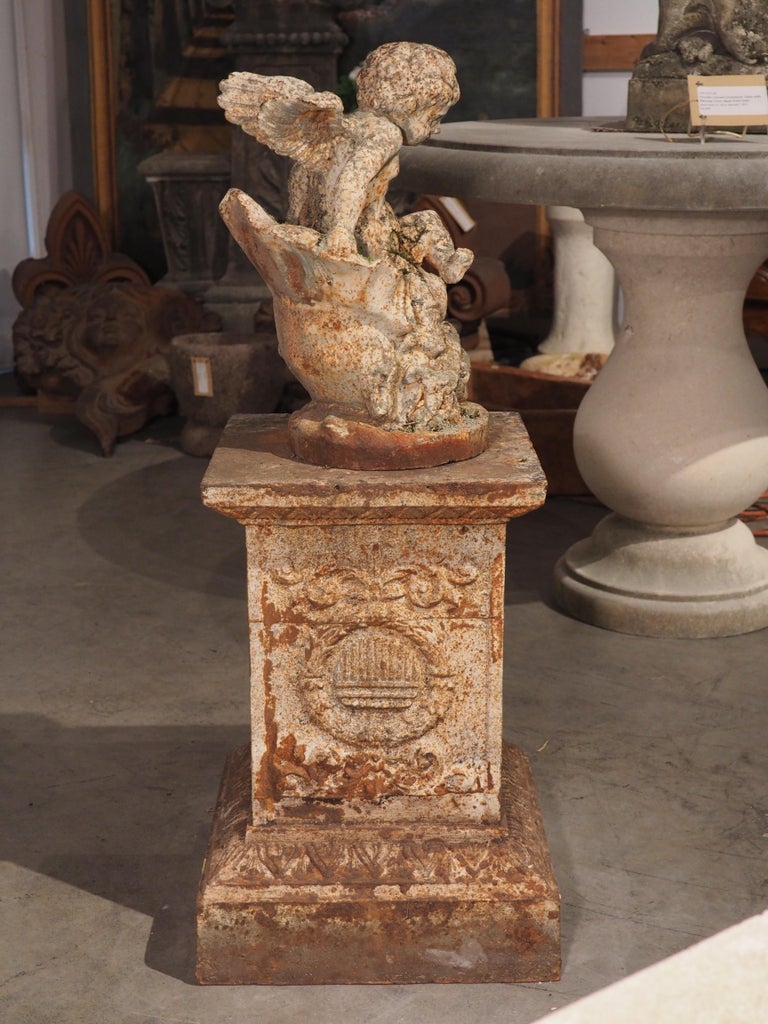 Small French Cast Iron Putto on Pedestal, Circa 1880 at 1stDibs