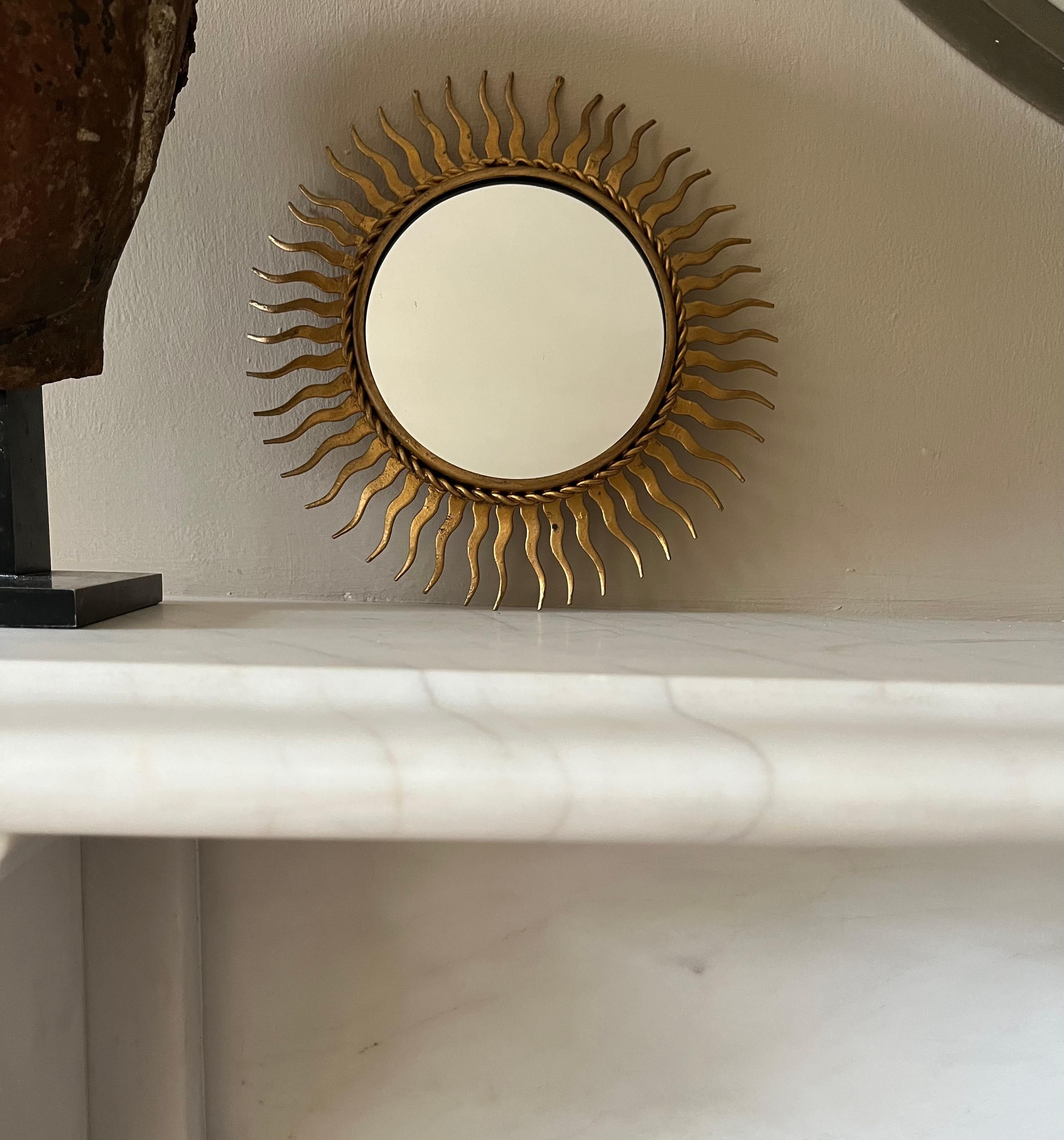 Small French gilt metal starburst mirror For Sale at 1stDibs