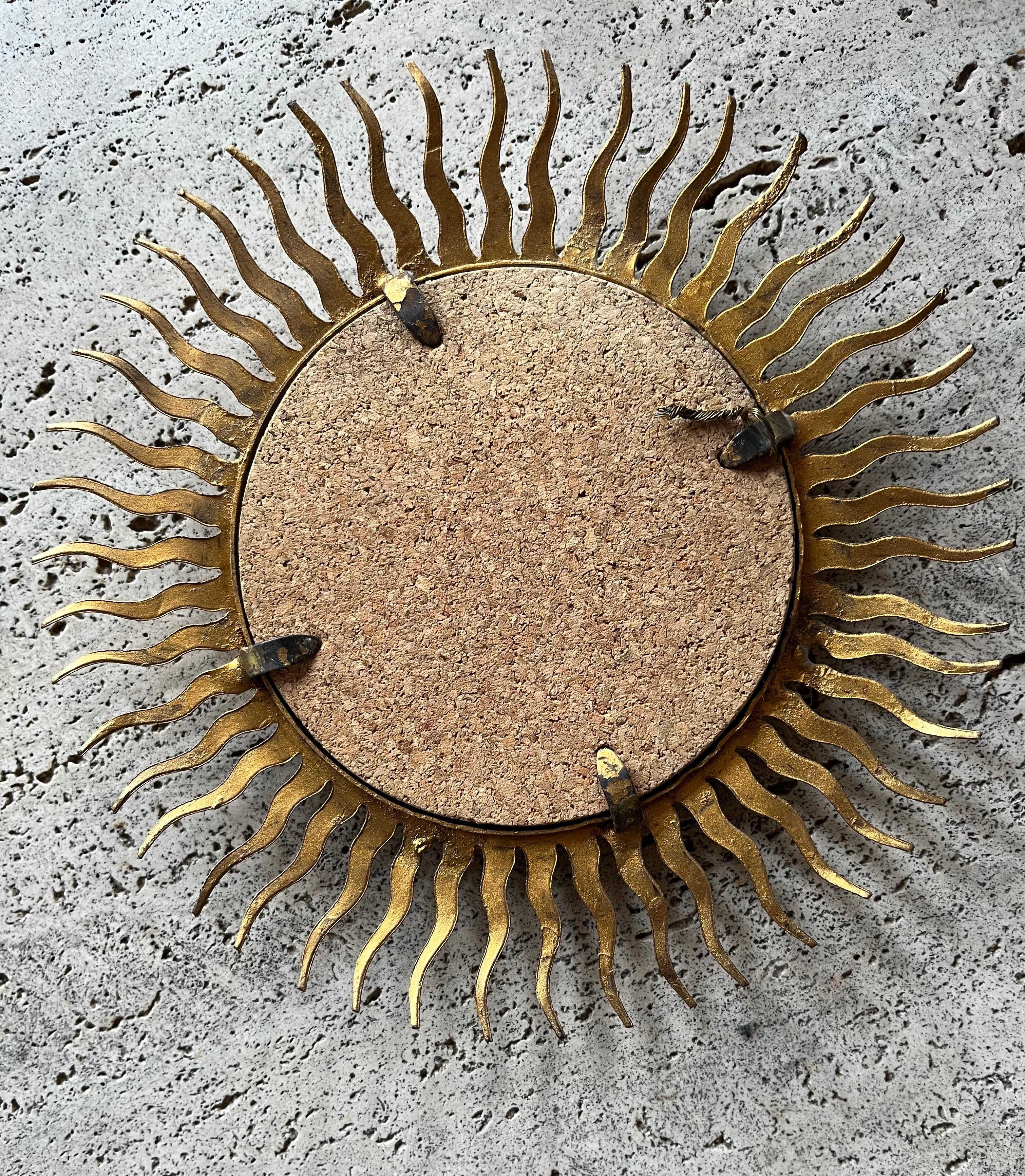 Small French gilt metal starburst mirror For Sale at 1stDibs