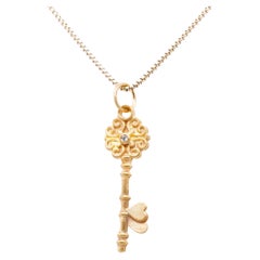 Miniature Key Charm Pendant Necklace, 24kt Solid Gold For Sale at 1stDibs