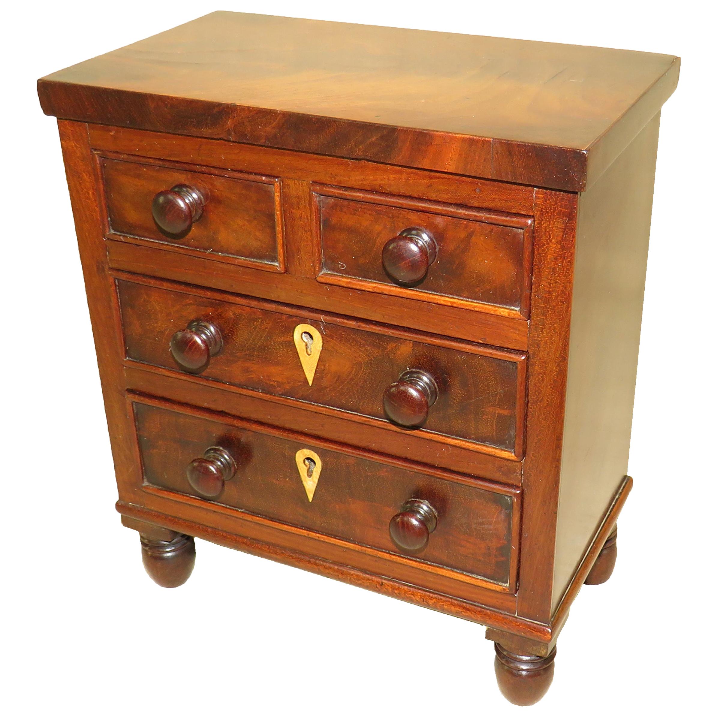 American Classical Carved and Figured Mahogany Miniature Chest at 1stDibs