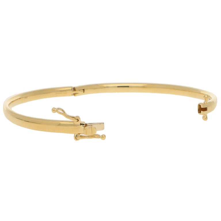 Solid 18 Karat Yellow Gold Hinged Bangle with Safety Catch at 1stDibs
