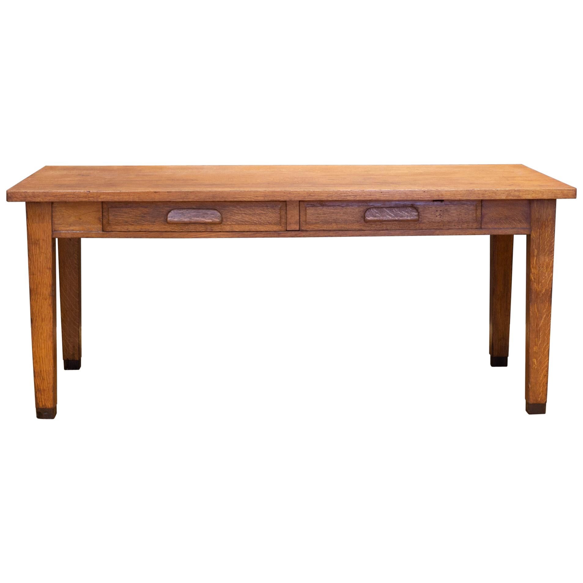 Solid Oak Two-Drawer Desk with Brass Feet, circa 1940 at 1stDibs