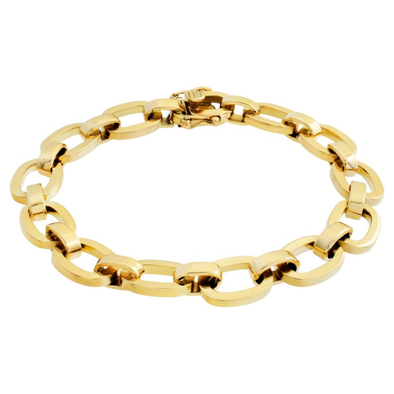 Solid open oval link bracelet in 18K yellow gold. 7 inches long. For ...