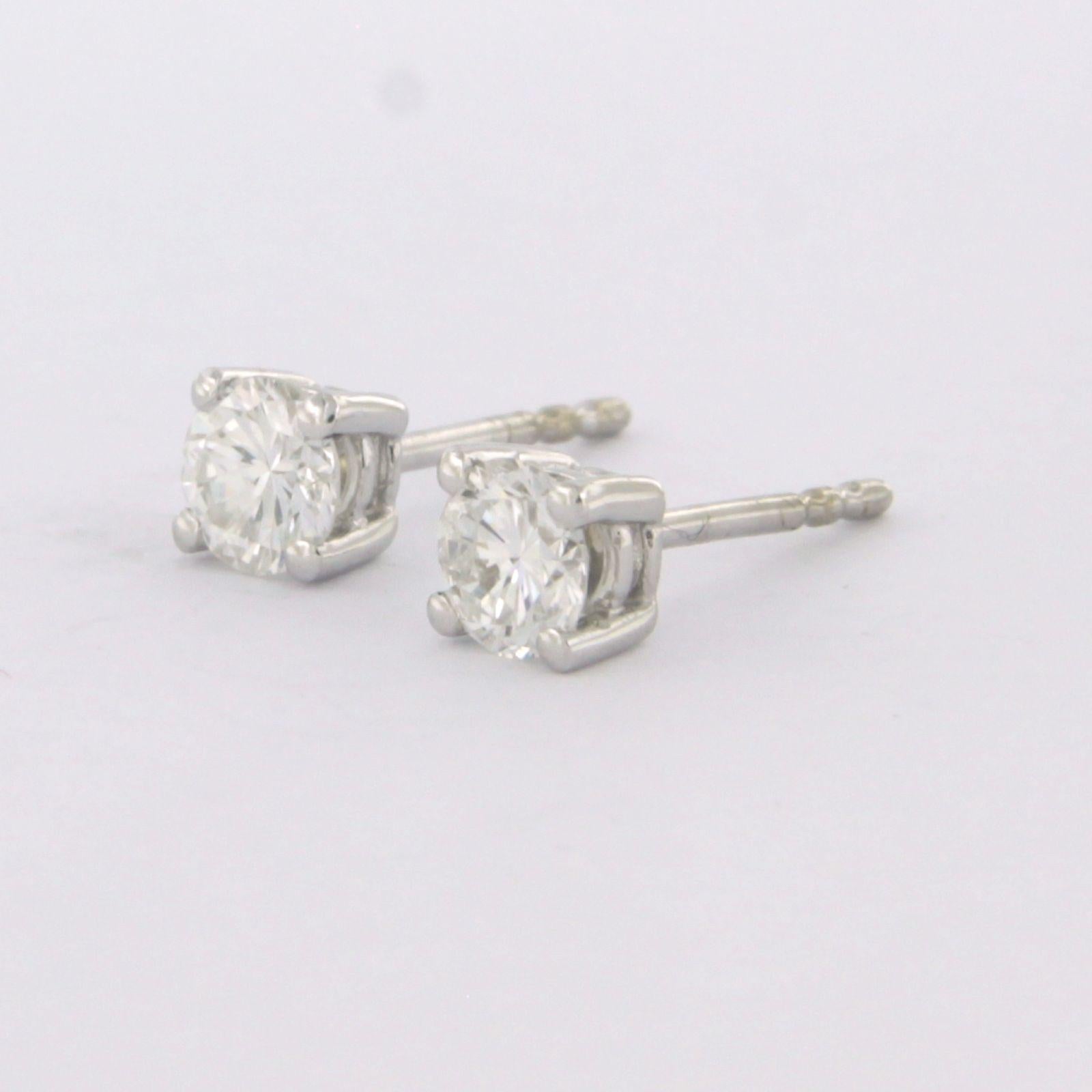 Solitaire Stud earrings set with diamond 18k white gold For Sale at 1stDibs
