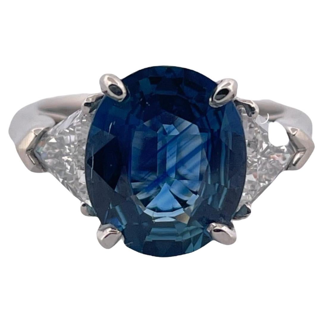 Elegant Cylon Sapphire Ring with Trillion Cut Diamond in Platinum For ...
