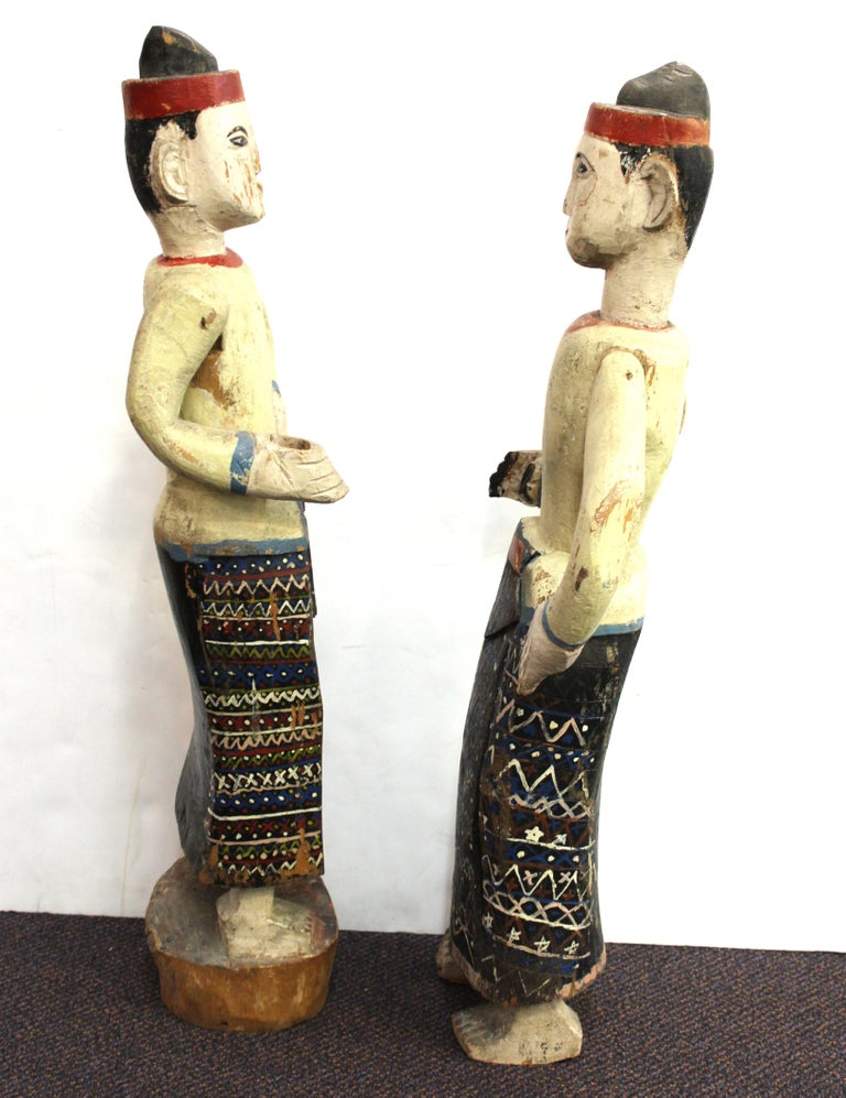 South-East Asian Carved and Painted Wood Figures of Men in Sarongs at ...