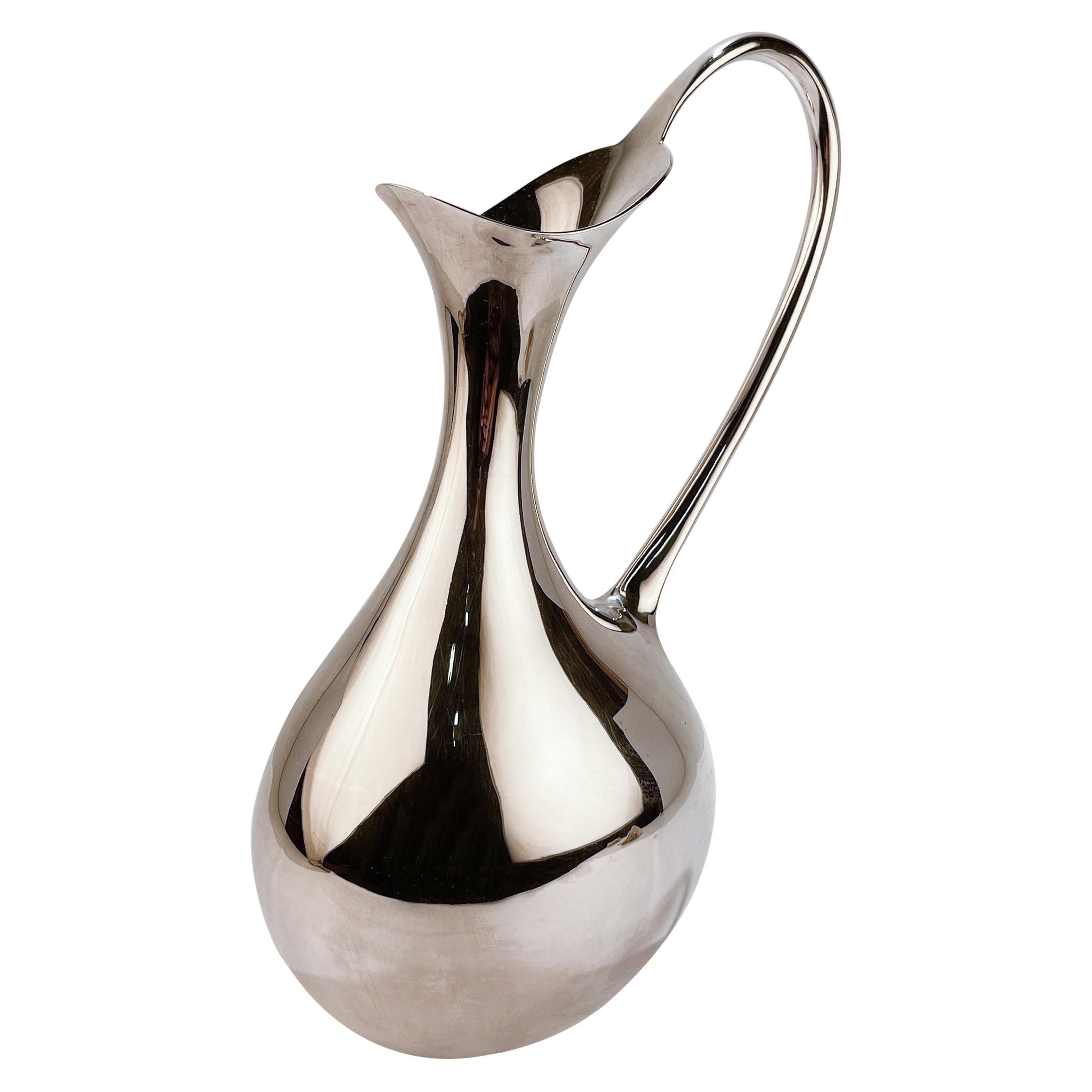 An Art Deco textured silver pitcher at 1stDibs
