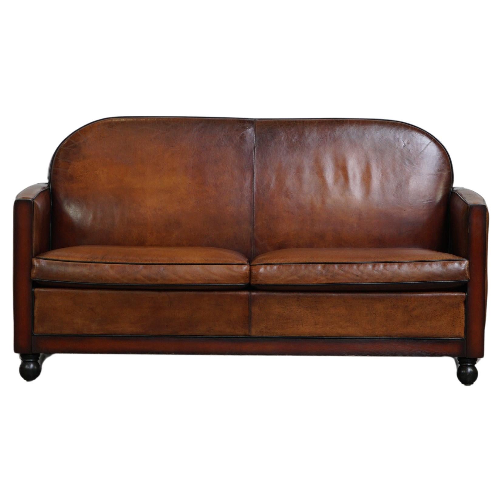Spacious 2-seater sheepskin Art Deco design sofa finished with wood For ...