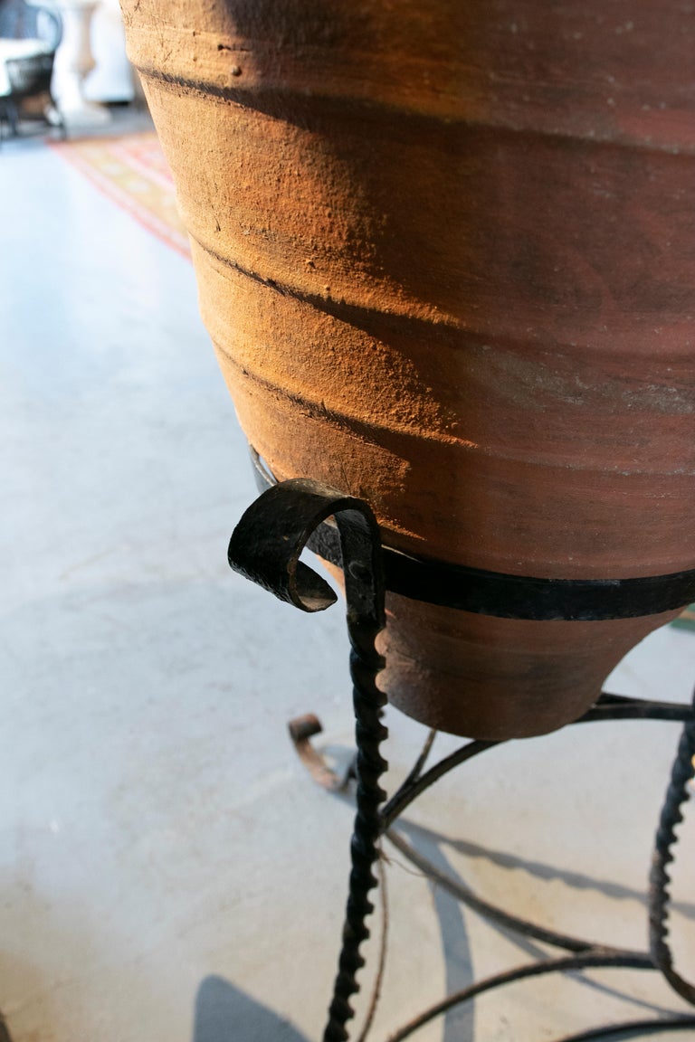 Spanish Handmade Ceramic Jar with Iron Base For Sale at 1stDibs