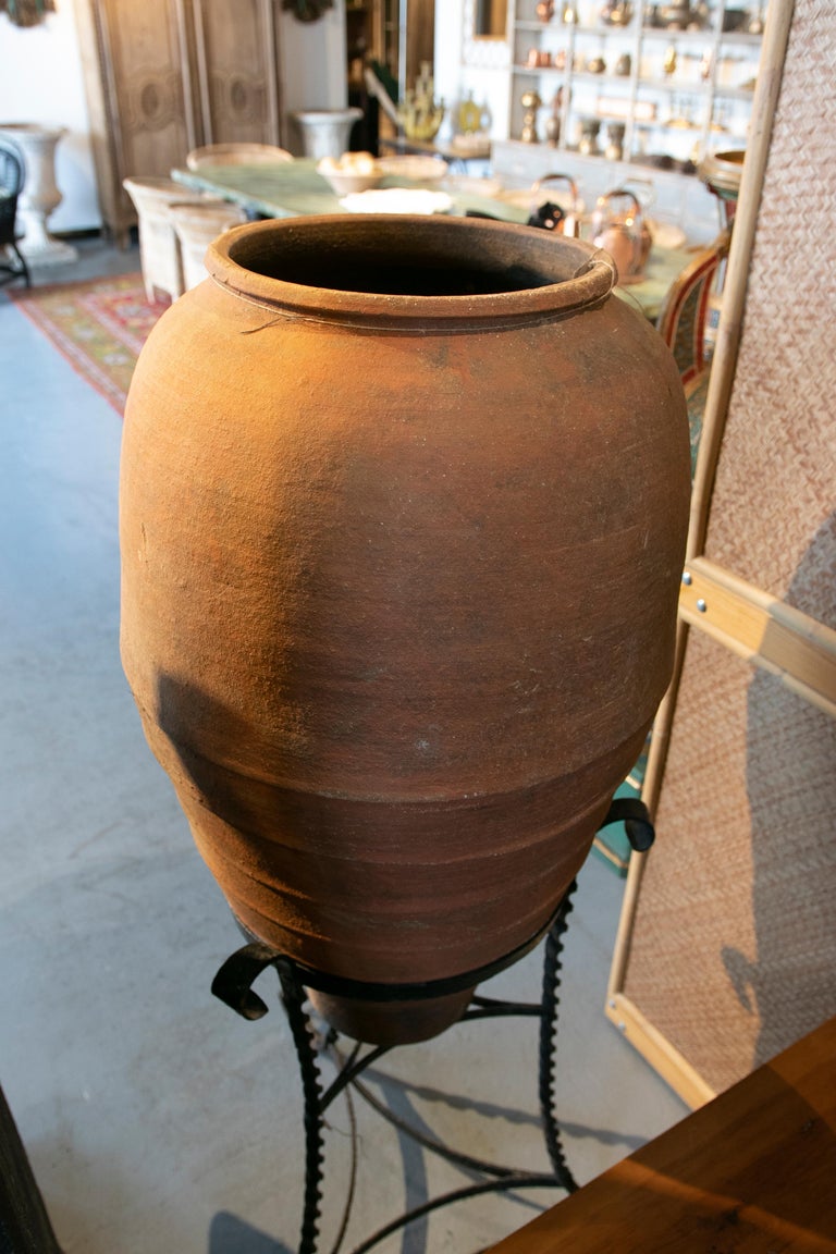 Spanish Handmade Ceramic Jar with Iron Base For Sale at 1stDibs