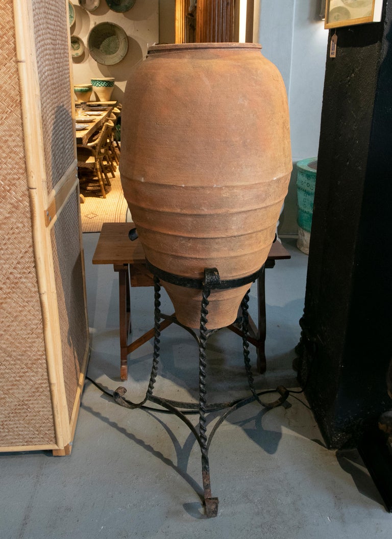 Spanish Handmade Ceramic Jar with Iron Base For Sale at 1stDibs