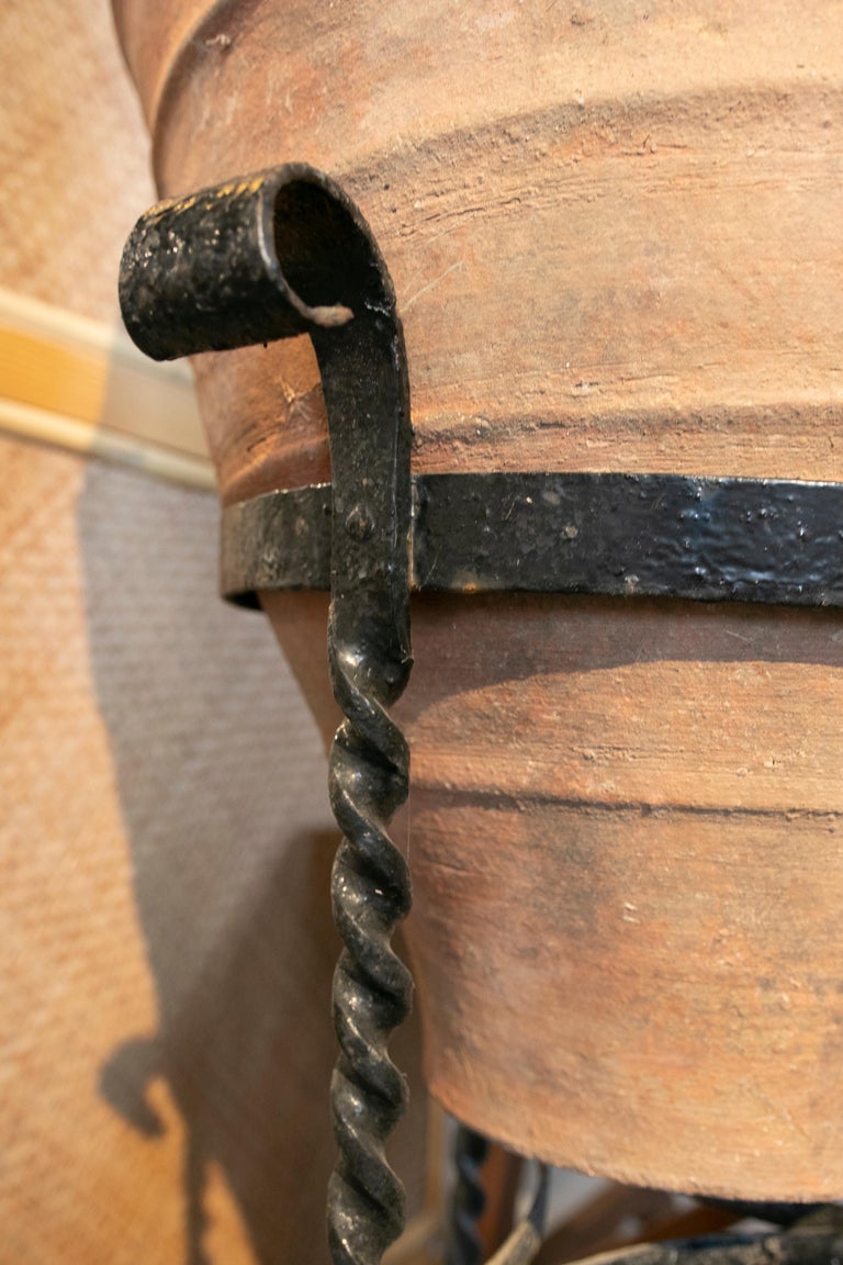 Spanish Handmade Ceramic Jar with Iron Base For Sale at 1stDibs