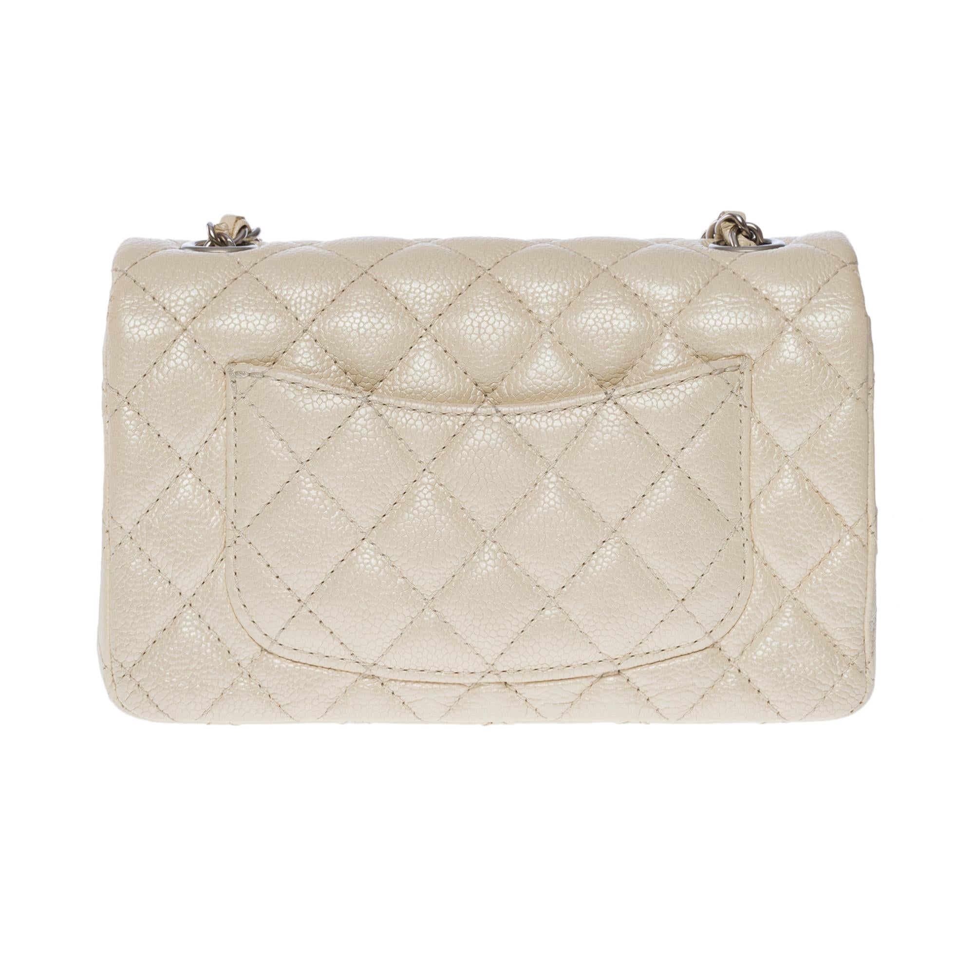 Splendid Chanel Timeless Mini Flap bag in off white pearl quilted leather, SHW For Sale at 1stDibs